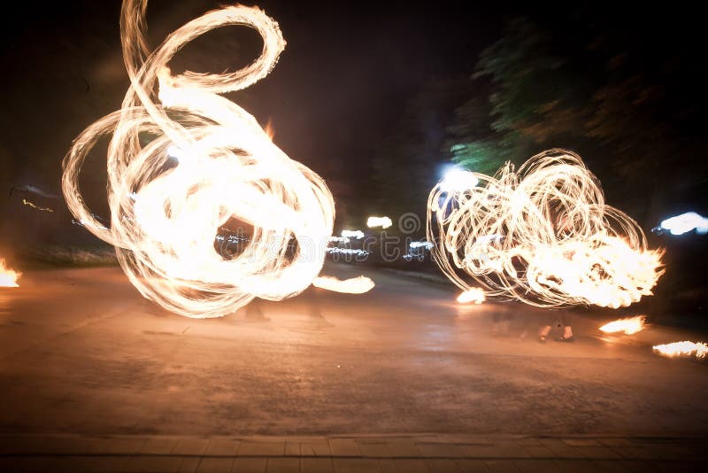 Amazing Fire Show Dance. Fire Dancer Playing with Flame Stock Photo ...