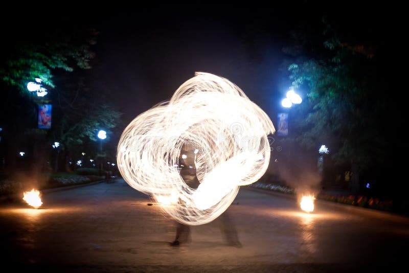 Amazing Fire Show Dance. Fire Dancer Playing with Flame Stock Image ...