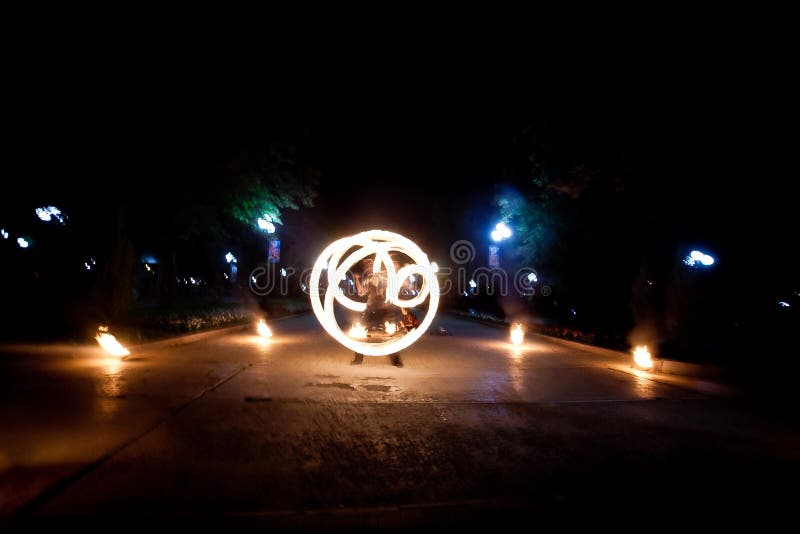 Amazing Fire Show Dance. Fire Dancer Playing with Flame Stock Image ...