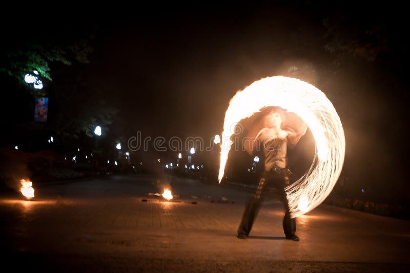 Amazing Fire Show Dance. Fire Dancer Playing with Flame Stock Photo ...