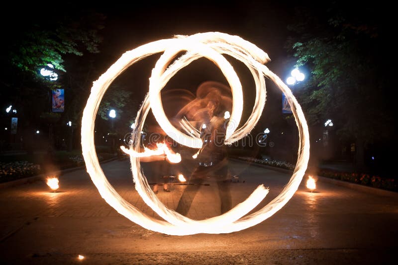 Amazing Fire Show Dance. Fire Dancers Playing with Flame Stock Photo ...
