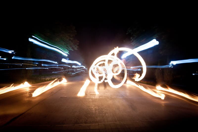 Amazing Fire Show Dance. Fire Dancers Playing with Flame Stock Photo ...