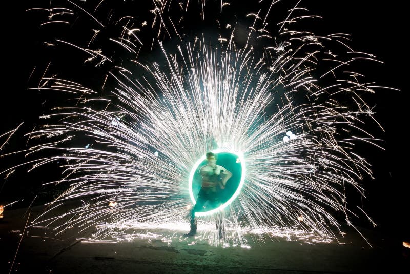 Amazing Fire Show Dance. Fire Dancer Playing with Flame Editorial Image ...