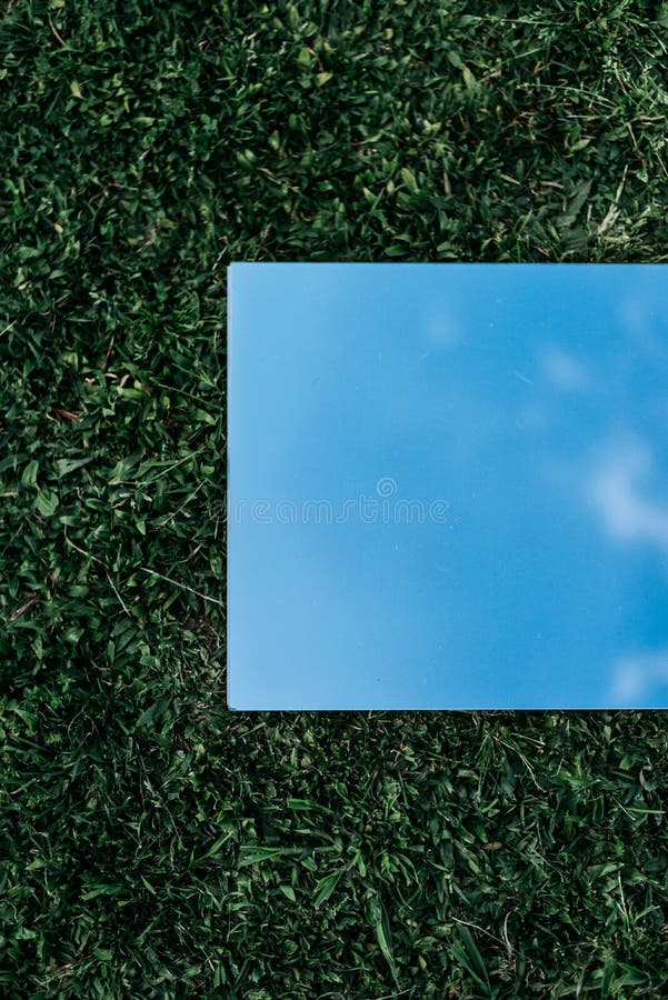 Amazing Flat Lay of a Mirror on the Grass Stock Photo - Image of copy ...