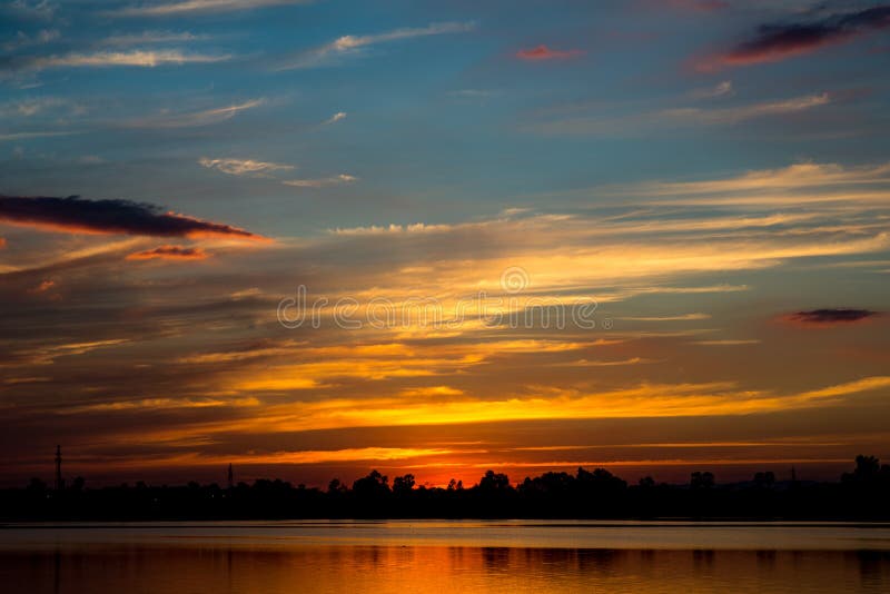 Amazing Golden Sunset Sky with Reflection on Calm Lake Stock Image ...