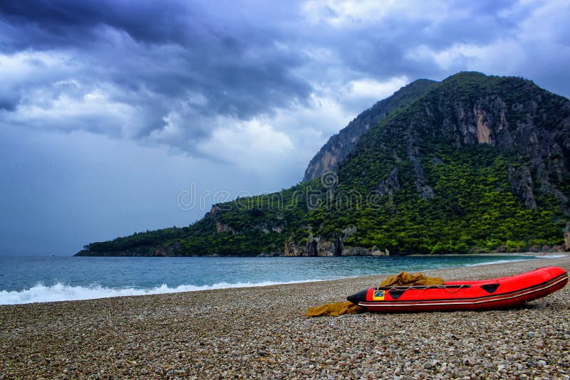 Amazing Landscape of Mountain Near the Sea with Stone Beach and Blue ... Amazing Landscape of Mountain Near the Sea with Stone Beach and Blue ...