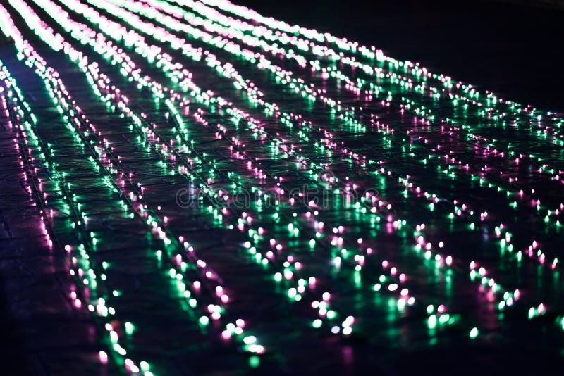 Colorful Wire LED Lights on White Wire, Lying on the Floor. New Year ...