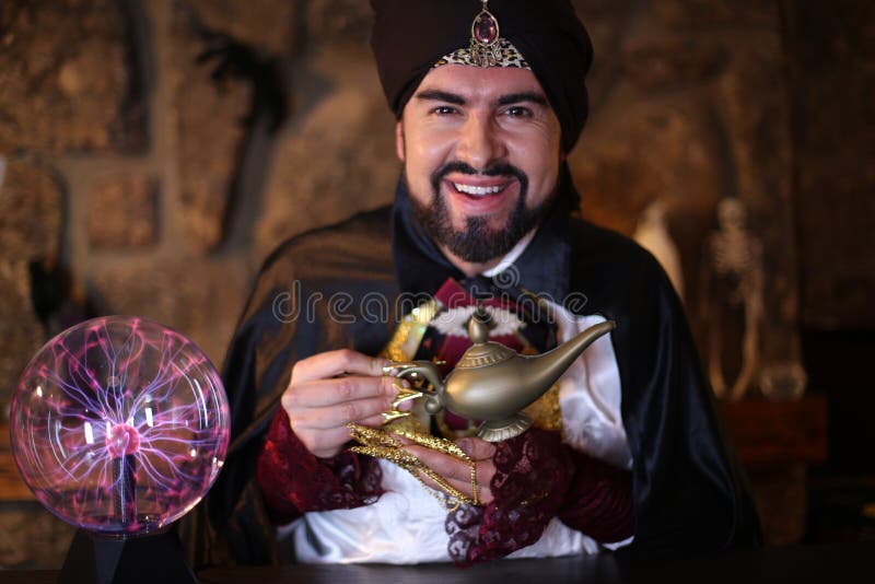 Amazing Man Holding Genie Lamp Stock Image - Image of funny, islam ...