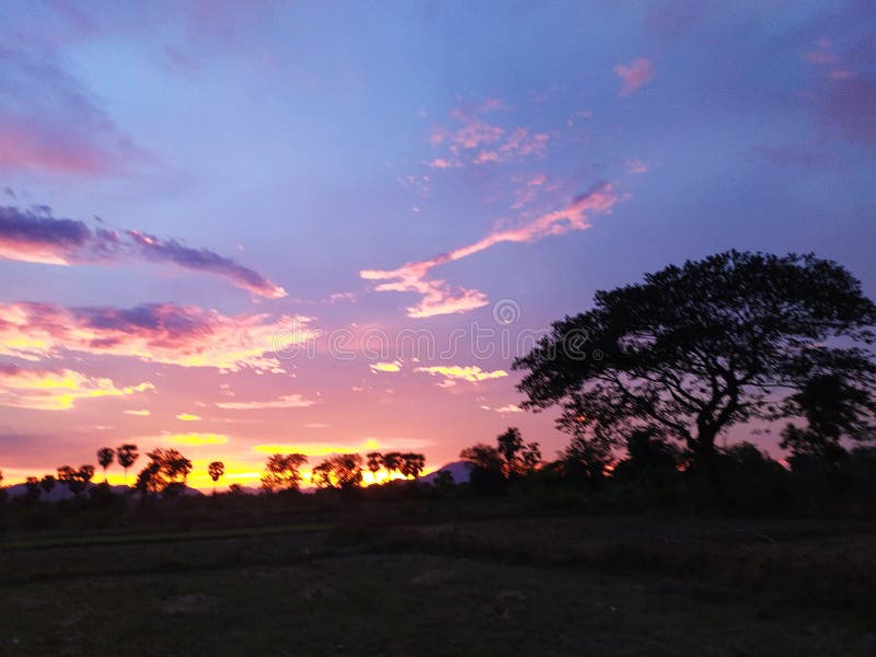 The Amazing Natural View of Village Sunset in Evening. Stock Photo ...