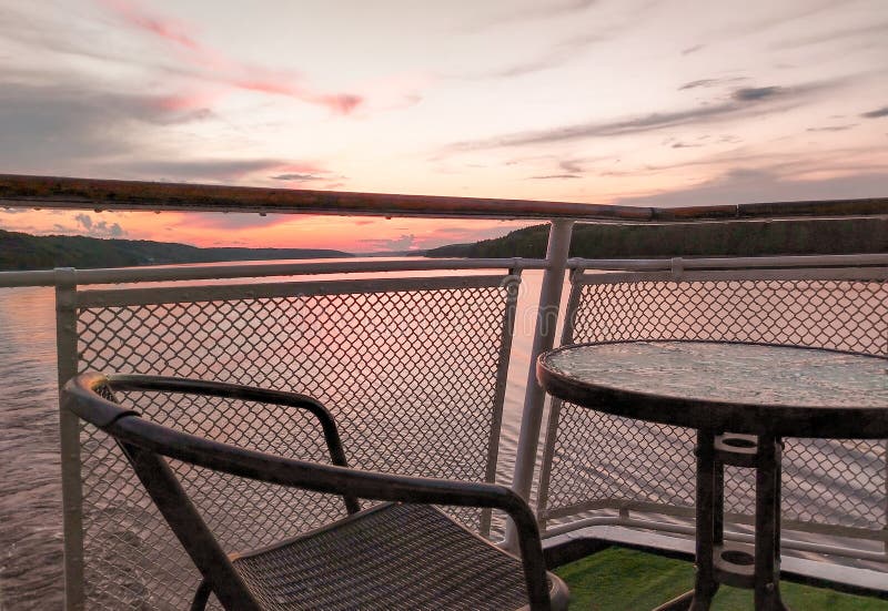 Amazing Romantic Sunset on the Ship Deck with Table and Chairs Stock ...