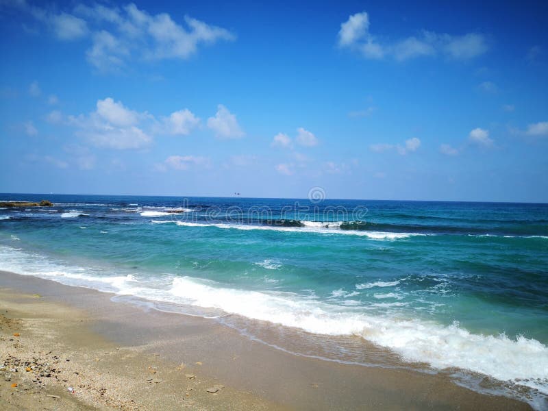 Exotic blue seascape stock image. Image of cliffs, island - 155054597