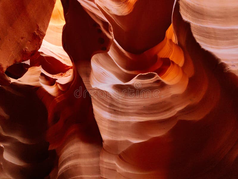 Amazing Shot of an Orange Wave Cave Under Sunlight Stock Photo - Image ...