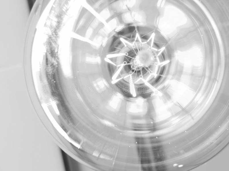 Electricity Current Inside a Retro Crystal Clear Light Bulb. Stock ...