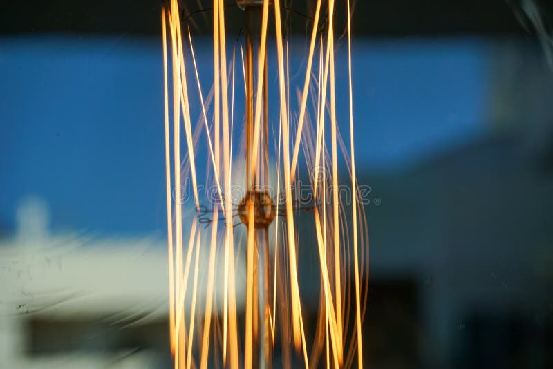 Electricity Current Inside a Retro Crystal Clear Light Bulb. Stock ...