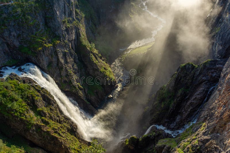 Amazing Sunbeams Passing through the Mist Created by the Voringfossen ...