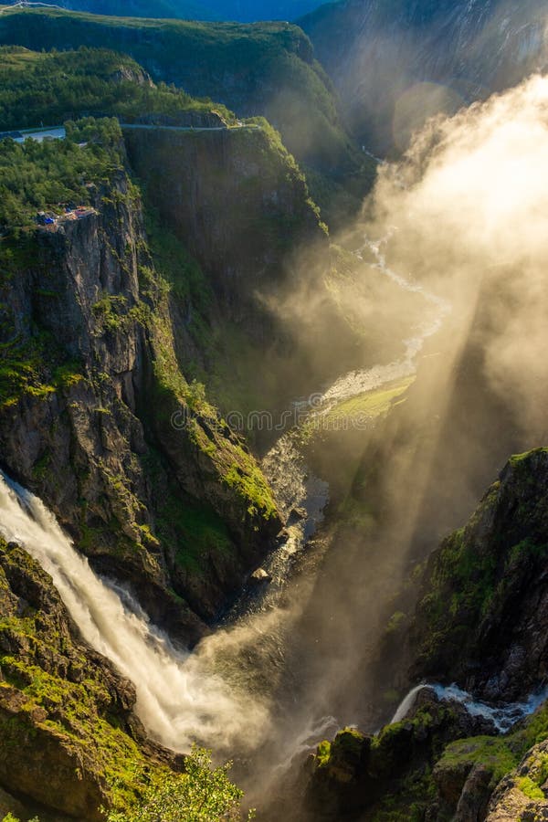 Amazing Sunbeams Passing through the Mist Created by the Voringfossen ...
