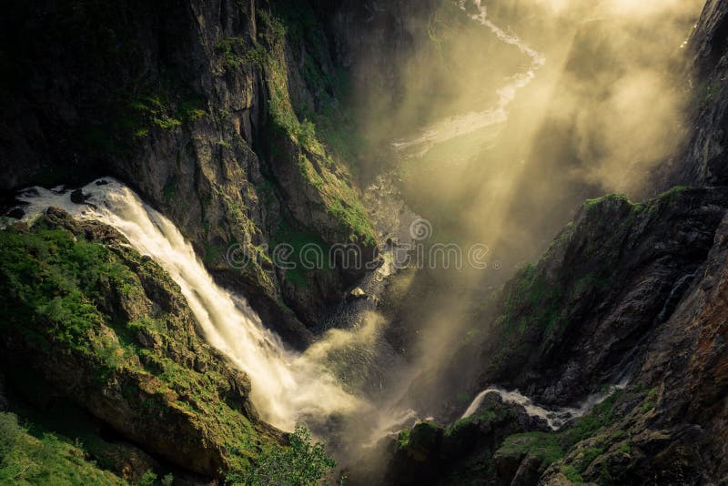 Amazing Sunbeams Passing through the Mist Created by the Voringfossen ...