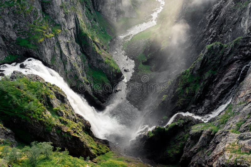 Amazing Sunbeams Passing through the Mist Created by the Voringfossen ...
