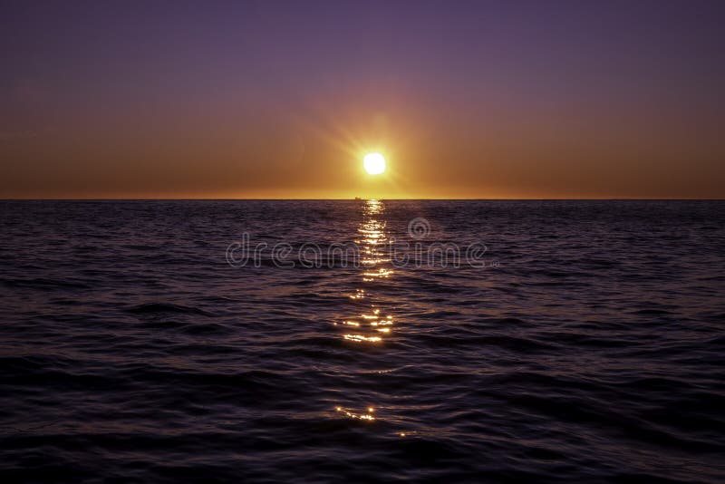 Amazing Sunset on the Atlantic Ocean. the Sun Reflected in the Waves ...