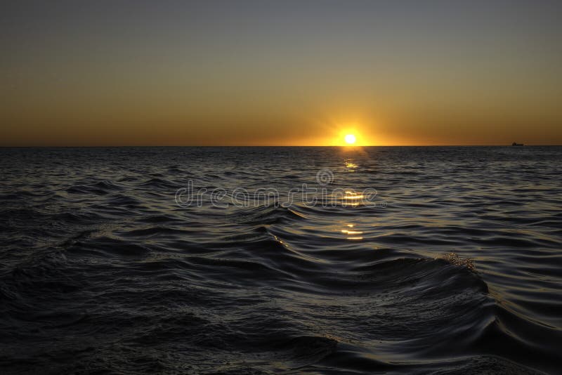 Amazing Sunset on the Atlantic Ocean. the Sun Reflected in the Waves ...