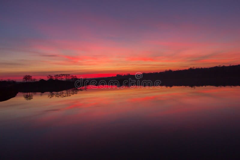 Amazing sunset colors stock image. Image of outline, water - 63448353