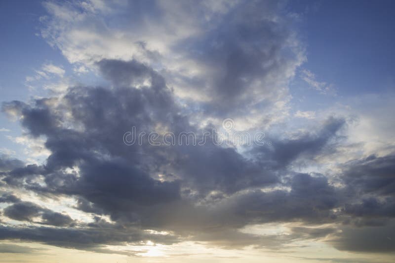Amazing Sunset with Grey Clouds and Blue Sky Stock Image - Image of ...