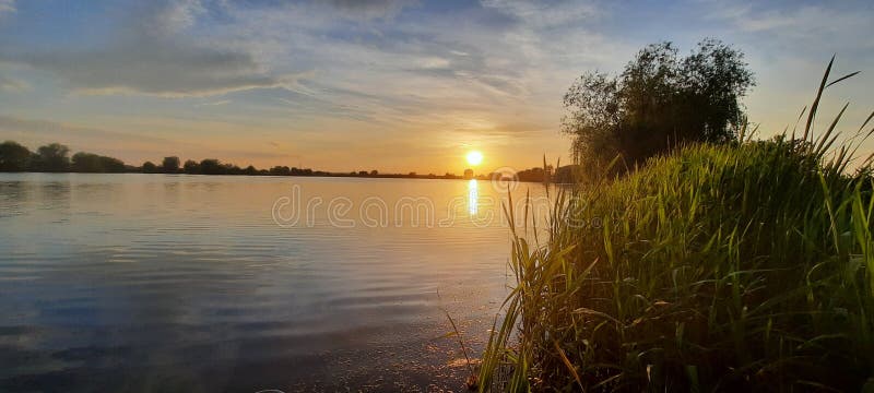 Amazing Sunset Over the Lake in the Summer Season Stock Image - Image ...