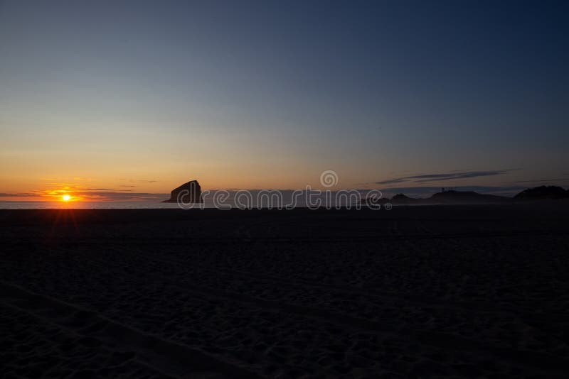 Amazing Sunset in Pacific City, Oregon Coast. Sun Going Down Behind ...