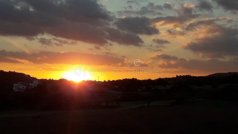 Amazing Sunset View on a Cloudy Day Stock Photo - Image of cloudy, view ...