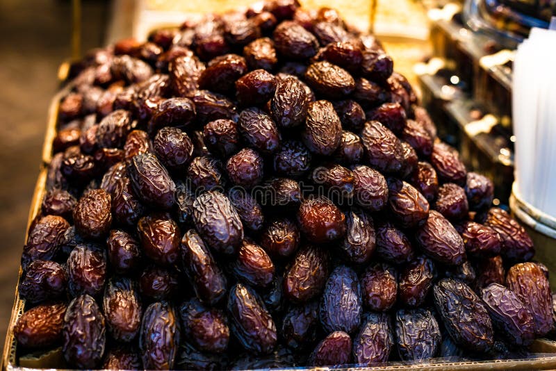 Huge Sweet Dates on the Blurred Background Stock Image - Image of ...