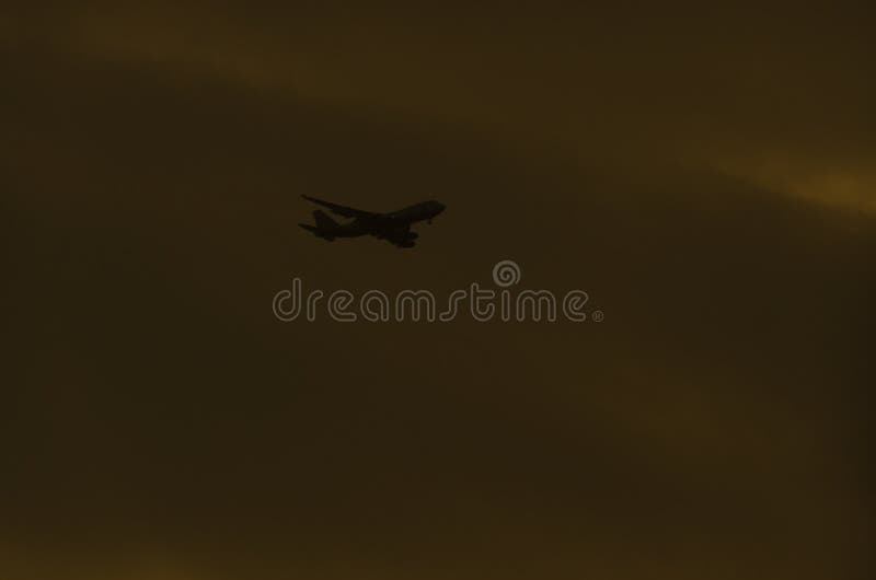 Amazing View on Airplane Flying in the Sky during Solar Eclipse. Plane ...