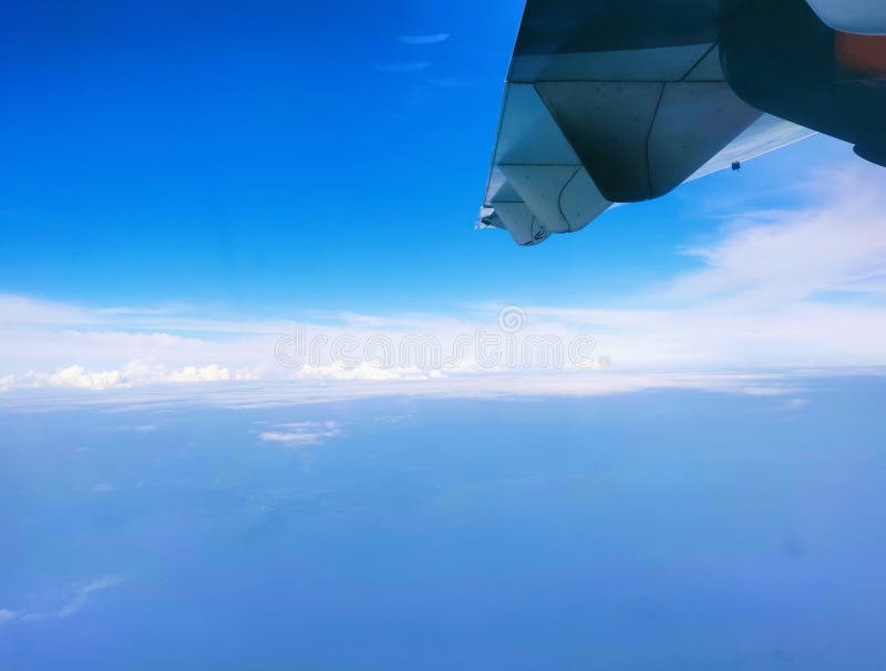 Amazing View of Blue Sky and Blue Ocean Seen from Airplane Window Stock ...