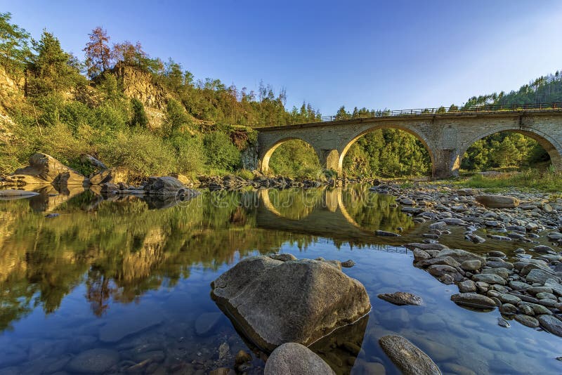 The Peaceful River and Old Stone Bridge Stock Image - Image of bridge ...