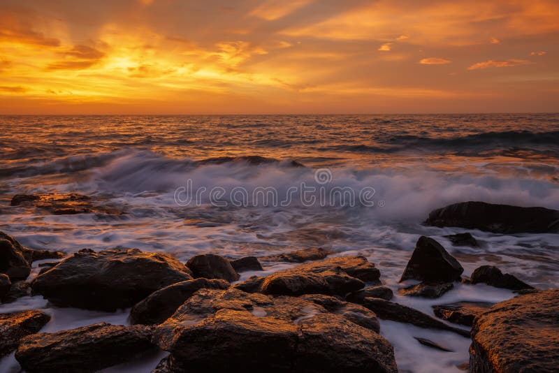 Sunrise over the sea stock photo. Image of long, colorful - 65659990