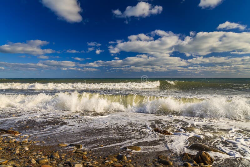 Amazing Wavy Sea on a Background of Blue Sky Stock Photo - Image of ...