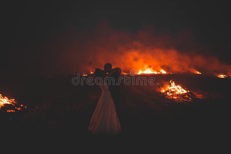 Amazing Wedding Couple Near the Fire at Night Stock Photo - Image of ...