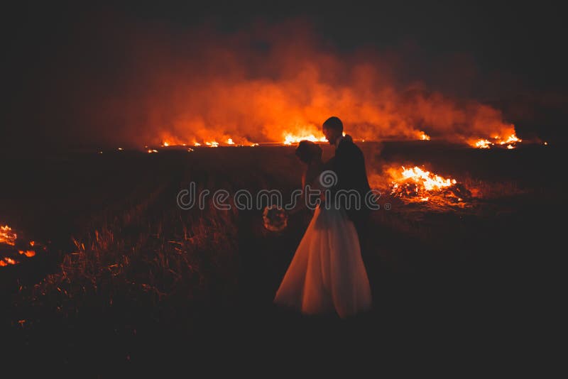 Amazing Wedding Couple Near the Fire at Night Stock Photo - Image of ...