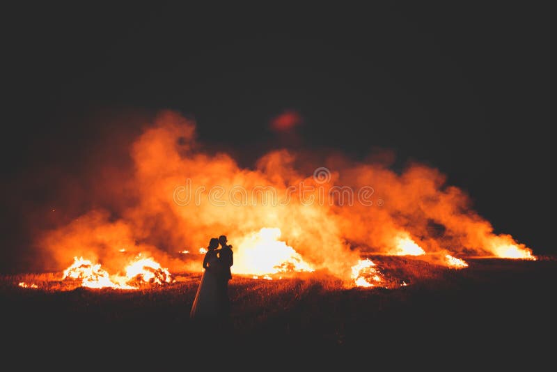 Amazing Wedding Couple Near the Fire at Night Stock Photo - Image of ...