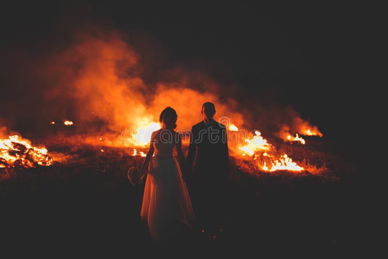Amazing Wedding Couple Near the Fire at Night Stock Image - Image of ...