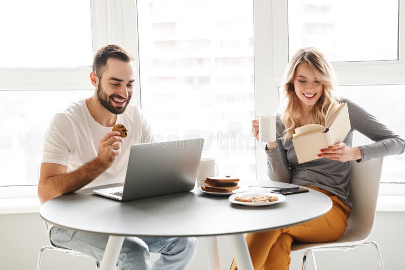 Amazing Young Loving Couple Sitting at the Kitchen Have a Breakfast ...