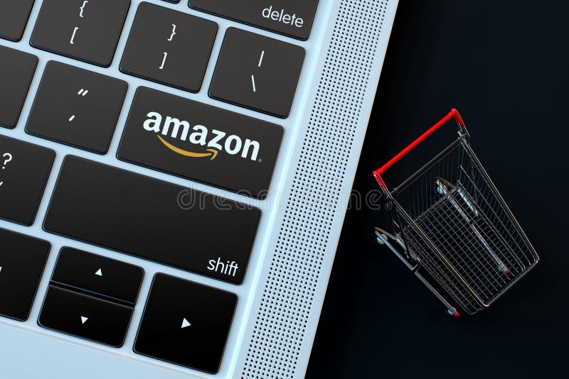 Amazon Logo on Laptop Keyboard and Miniature Shopping Cart. 3D ...