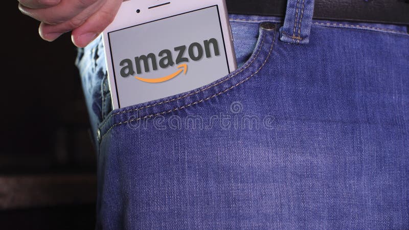 Amazon Logo on the Screen of Smartphone in Pocket. Editorial Shot Stock ...
