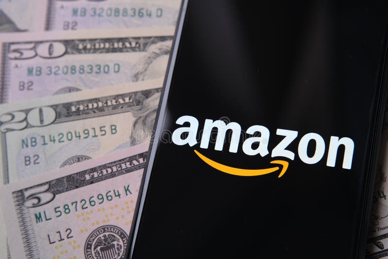 Amazon Logo on Smartphone Placed Next To Dollar Banknotes Editorial ...