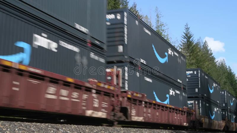 Amazon Prime Intermodal Container Freight Passing on Train in Closeup ...