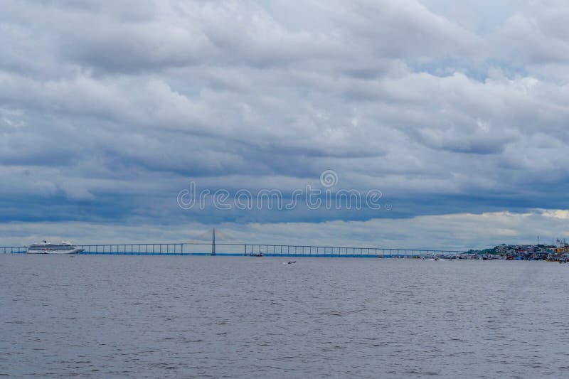 Amazon River with Manaus Bridge and Large Cruise Ship on the Left ...