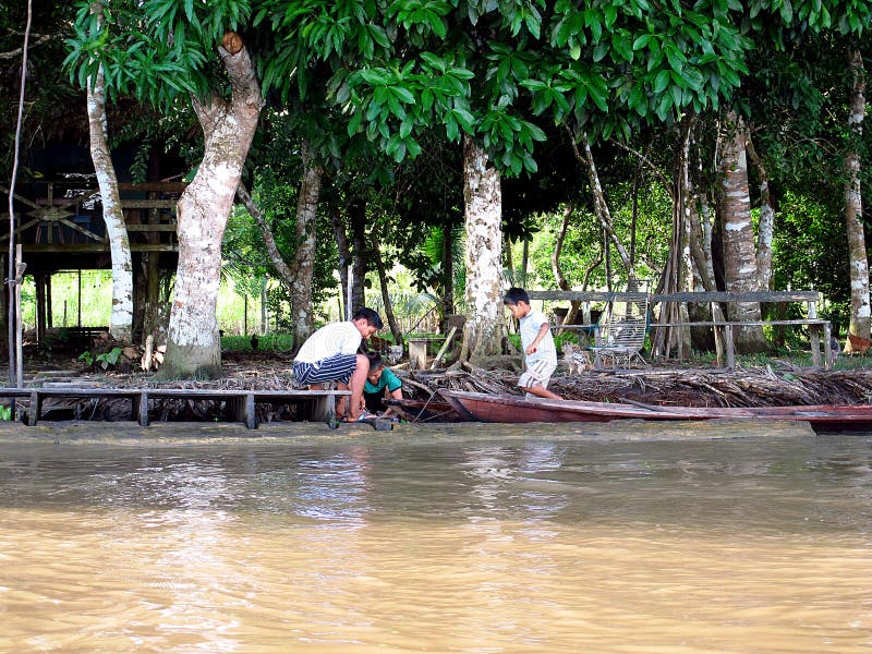 Amazon River, Peru - 12 May 2011: Indian Village on Amazon River, Peru ...