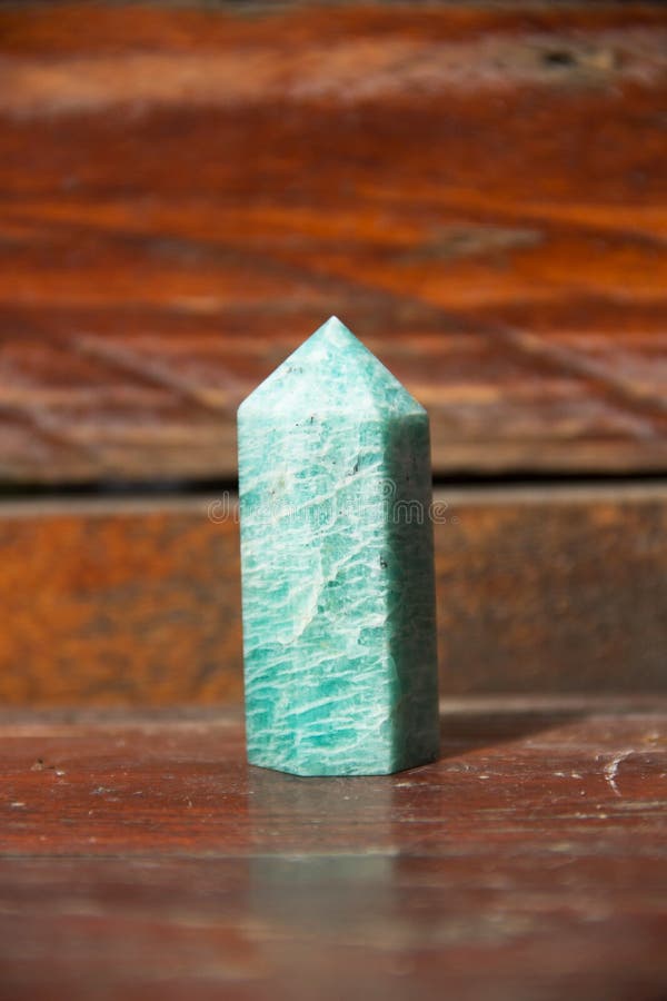 Amazonite crystal obelisk stock image. Image of stone - 231553415