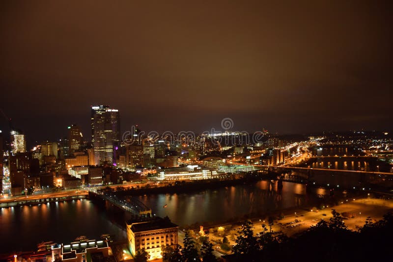 Amber City at Night stock image. Image of shadow, building - 47407119