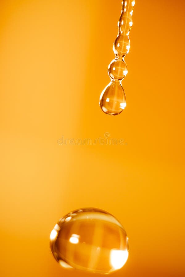Amber color waterdrop stock image. Image of isolated - 36683109
