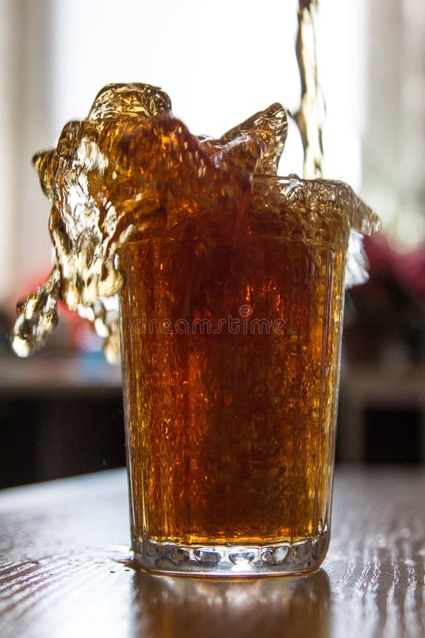 Amber drink in a glass stock photo. Image of beer, wine - 180900966